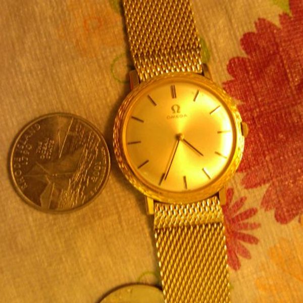 Vintage Omega 18K Gold Watch | WatchCharts