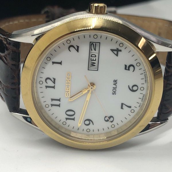 MALFUNCTIONING Seiko Men's Stainless Steel Solar Leather Band Watch - SNE056 | WatchCharts