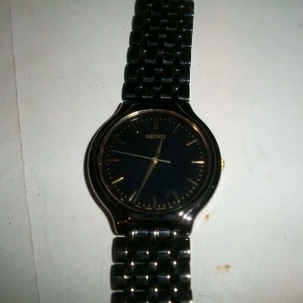 Vintage Seiko Black V701-1K20 Mens Quartz. Watch, Stacked Rice Band, works | WatchCharts