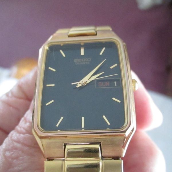 Seiko Men's Rectangular Gold-Tone Quartz Analog Watch Day & Date | WatchCharts Marketplace