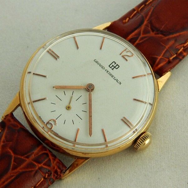 1950's GIRARD PERREGAUX WHITE DIAL 34.9MM GOLD PLATED CASE MANUAL WIND ...