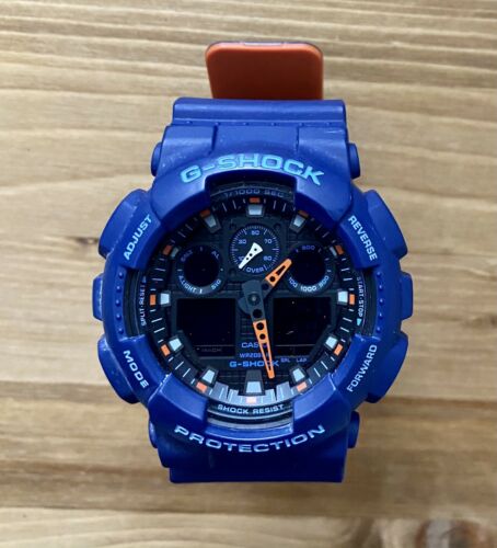 Casio G-Shock WR20BAR Navy Blue and Orange (GA-100L-2ACR) Digital Watch | WatchCharts