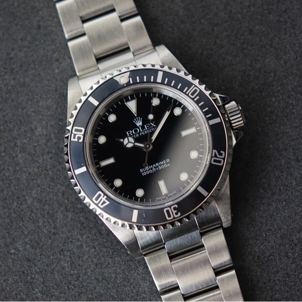 Rolex Submariner 14060 Faded Ghost bezel | WatchCharts Marketplace
