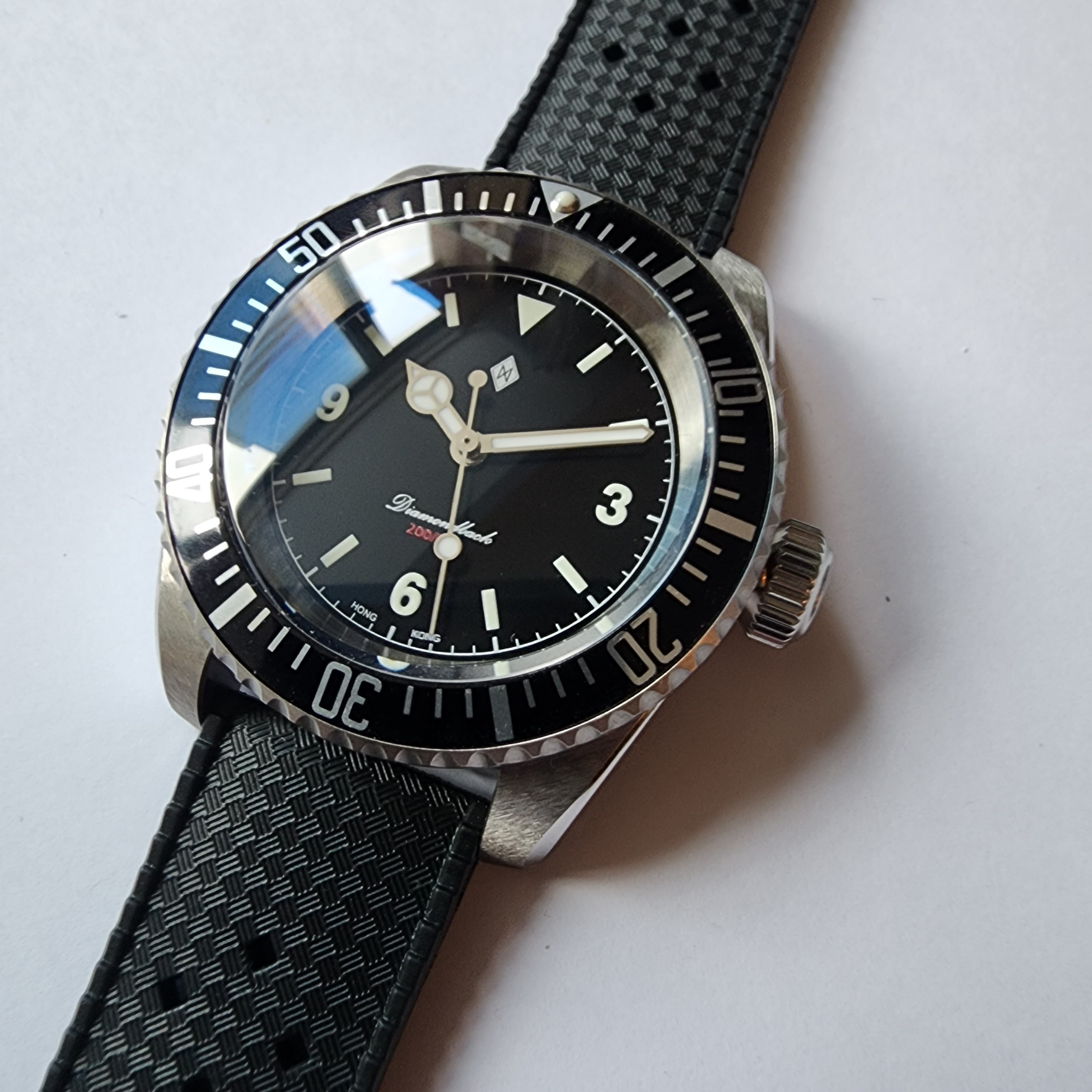 Dagaz Diamondback with NH35 movement explorer type dial. 149 USD WatchCharts Marketplace