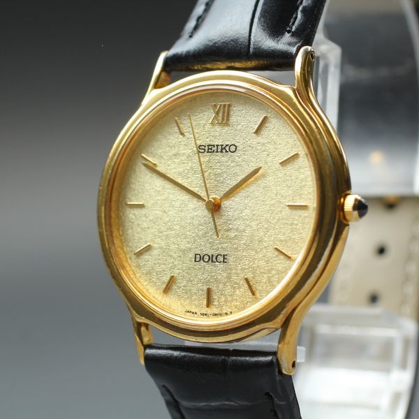 Vintage [Near MINT] Seiko Dolce 5E61-0A70 SADX00M Quartz Gold Men's Watch JAPAN | WatchCharts ...