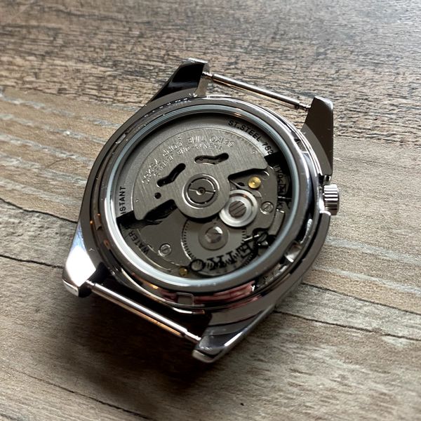 Seiko 5 SNK381 Men's Stainless Steel Black Numbers Dial Day Date Automatic Watch | WatchCharts ...