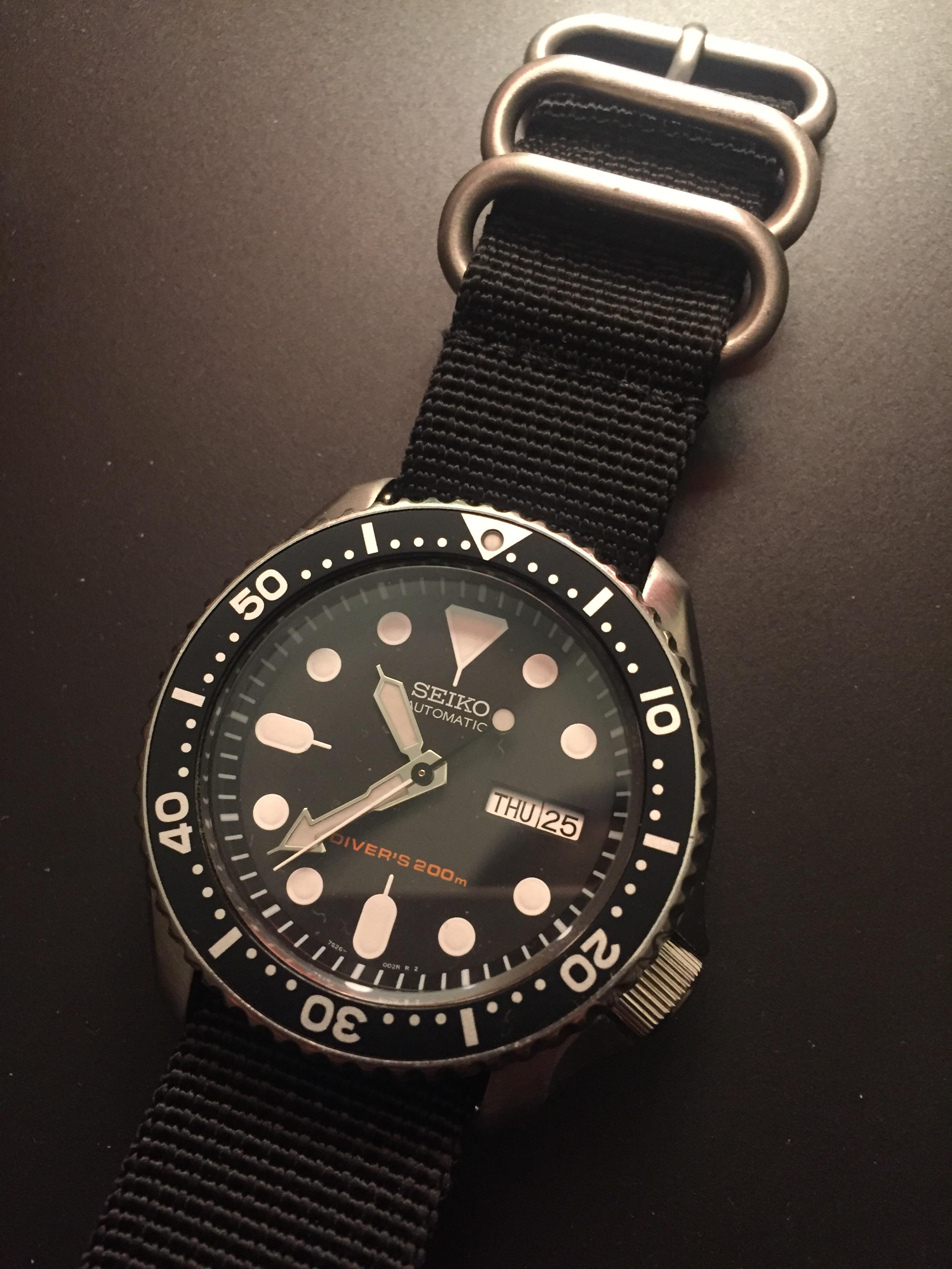 [WTS] Seiko SKX007 with 7 NATO straps, oyster bracelet | WatchCharts