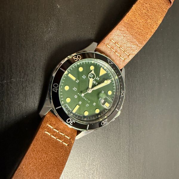 Timex Navi XL Automatic watch green dial | WatchCharts Marketplace