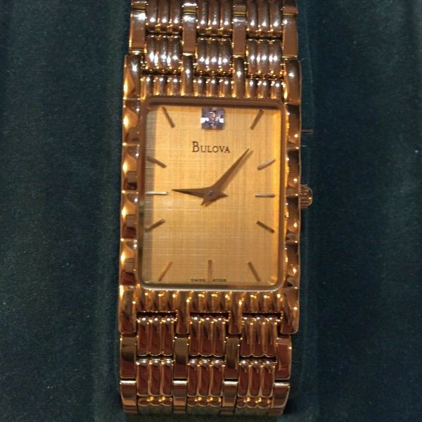Bulova Gold Tone Quartz Watch Swiss Made 97005 New in Box Keeps Good ...