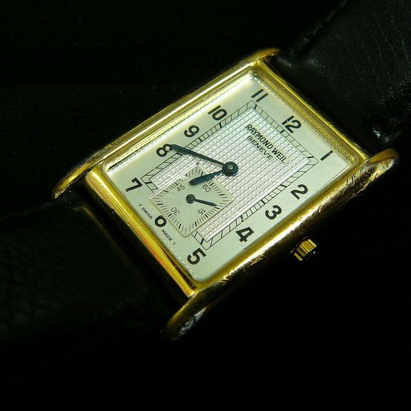 Raymond Weil 9831 tank cased Art Deco styled wristwatch | WatchCharts