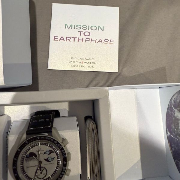 Omega X Swatch Earth phase | WatchCharts Marketplace