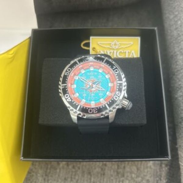 Invicta Men's Watch NFL Miami Dolphins Light Blue and Orange Dial Strap ...