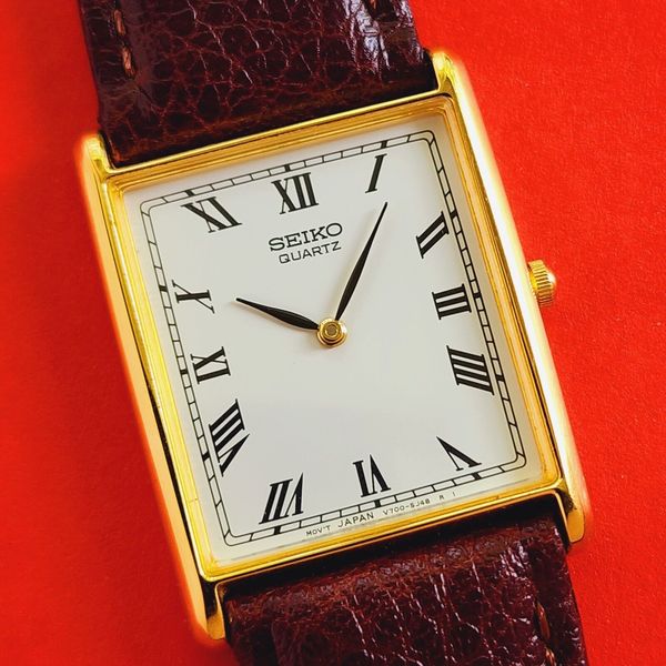 Seiko Tank Watch Rare Roman Dial Gold Coloured Case Leather V700-5K30 Vintage | WatchCharts ...