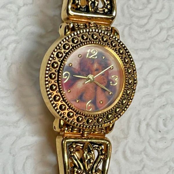 SII by Seiko Ladies Gold Tone Raphael's Thinking Cherub Watch 26mm New ...