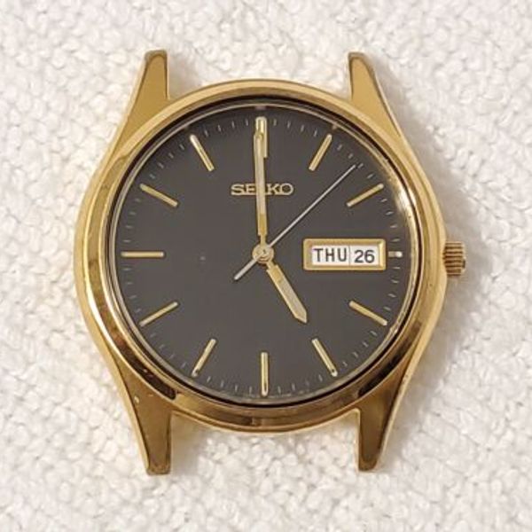 Vintage Seiko Men's Gold Tone Day Date Quartz Watch Black Dial One Jewel S Steel | WatchCharts ...