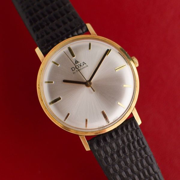 Doxa Solid Gold 14K Dress Watch from 1960s | WatchCharts Marketplace