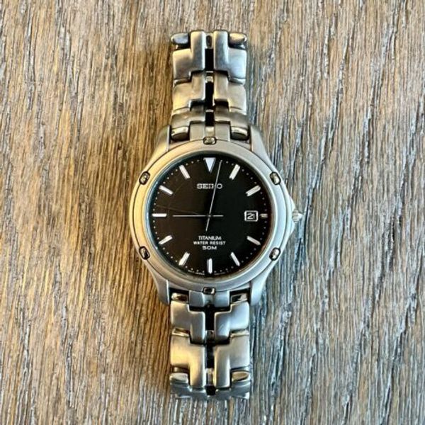 Seiko Titanium Watch 36mm Black Dial Date 7N32-0069 / New Battery ...