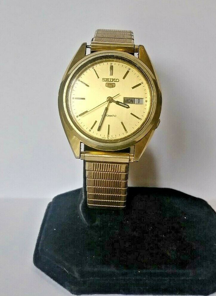 Vintage Mens Seiko 5 Automatic 7009-3040 Gold Tone Day/Date Automatic Watch 0194 | WatchCharts ...