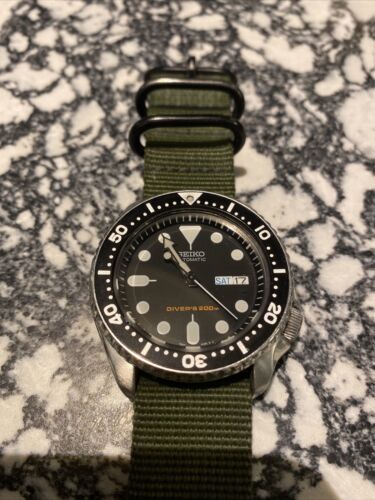 Seiko SKX007K2 Automatic Diver Watch 200M | WatchCharts