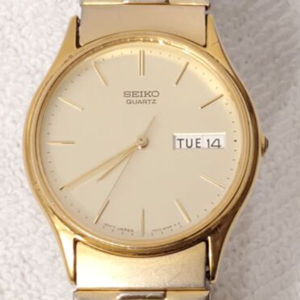 Vintage Seiko Men's Quartz Watch Gold Tone Stretch Band Day Date 1 Jewel S Steel | WatchCharts ...