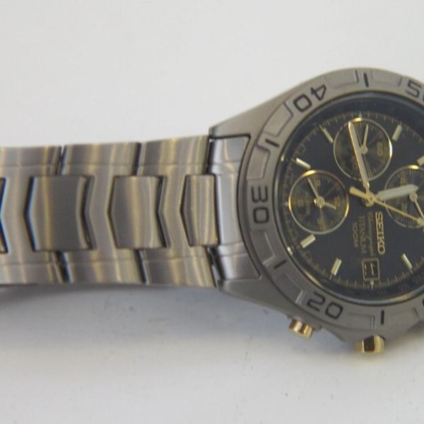 * Gent's SEIKO Quartz Chronograph Titanium 100M Wristwatch 7T62-0CT0 | WatchCharts Marketplace