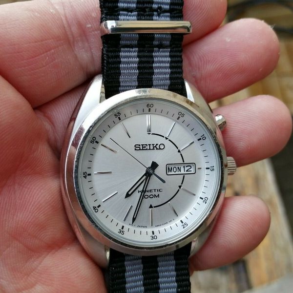 SEIKO KINETIC day date 5m63 0AK0 working low capacitor New Nato strap ...