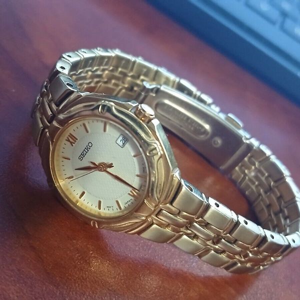 seiko 7N82 2.7 cm gold tone water resistant working watch | WatchCharts ...