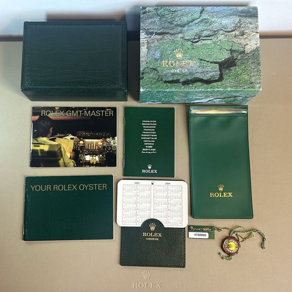 ROLEX GMT Master II 2003 | WatchCharts Marketplace