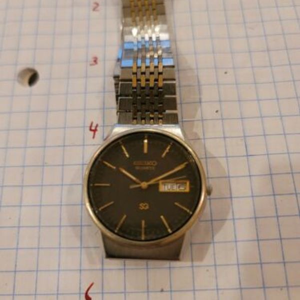 Vintage Seiko Quartz (8223-8009) Day Date Running Men's Watch | WatchCharts