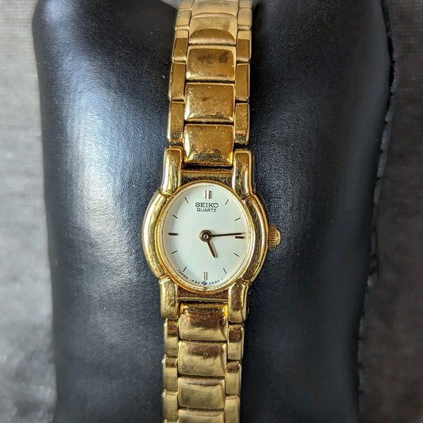 Seiko 1F20-5879 Women's 15mm Gold Tone Quartz Watch 6 1/2" Band | WatchCharts Marketplace