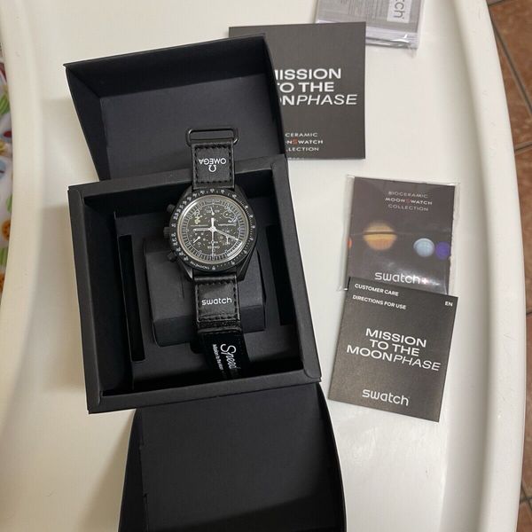 OMEGA & swatch Snoopy Moon Phase | WatchCharts Marketplace