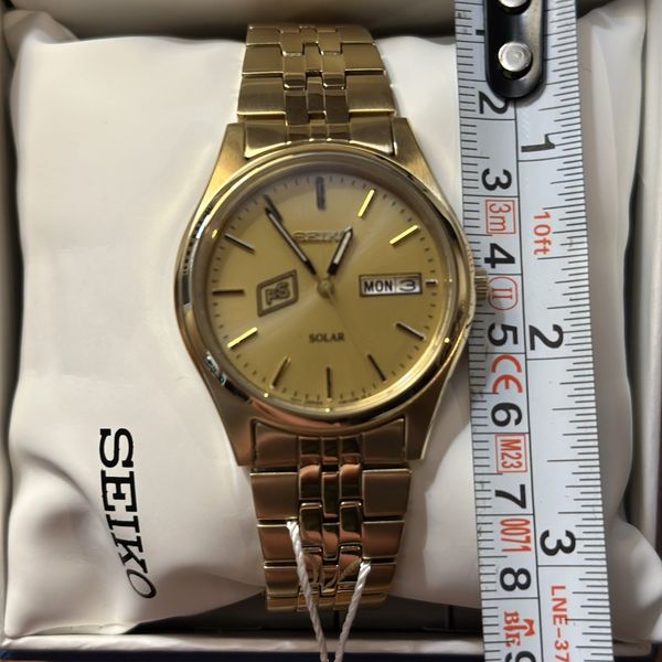 Seiko Solar Gold Tone Watch W/ FS Logo | Day-Date | Menâ s Quartz Stainless Steel | WatchCharts ...