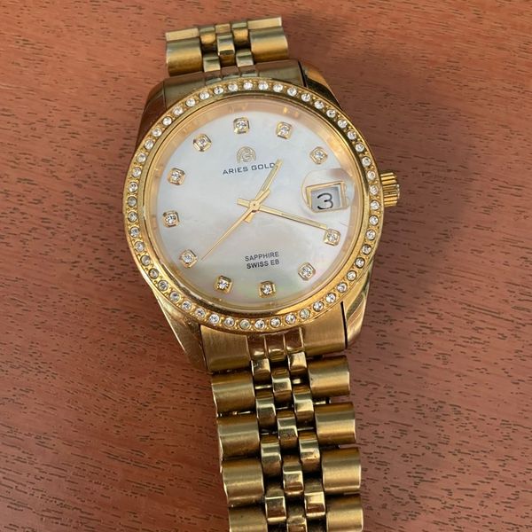 Aries Gold Sapphire Swiss EB Ladies Watch | WatchCharts Marketplace