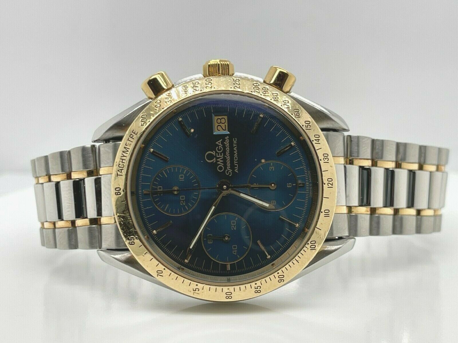 Omega Speedmaster Automatic Date blue dial two tone 33118000 ...