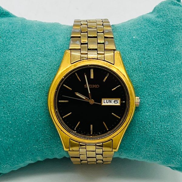 Vintage Seiko 7N43-9048 Men Gold Tone Black Quartz Watch Luminous Dial | WatchCharts Marketplace