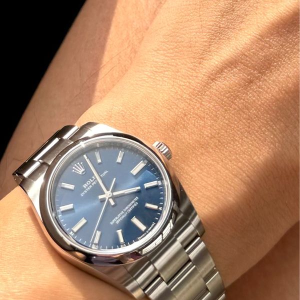 Rolex Oyster Perpetual 124200 Blue | WatchCharts Marketplace