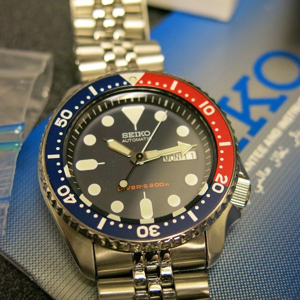 For sale or trade Seiko SKX009 with bracelet and extra bezel inserts ...