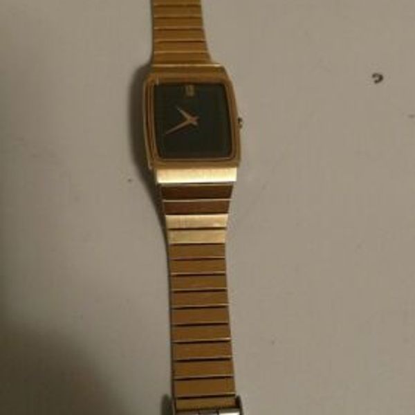 Seiko 5Y30-5859 R0 gold tone rectangle case men's watch | WatchCharts ...