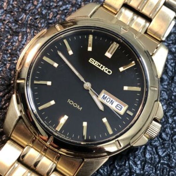 SEIKO Menâ s Gold Tone Dress Watch WR 100M Day And Date 7N43 New Battery | WatchCharts Marketplace