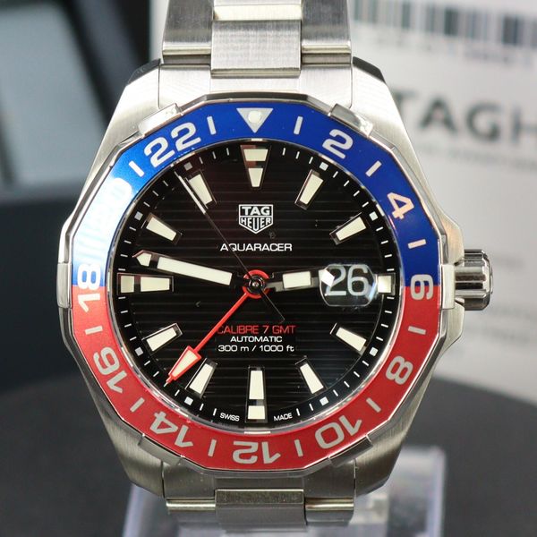Tag Heuer Aquaracer Pepsi GMT watch serviced by Tag Heuer Tag warranty ...
