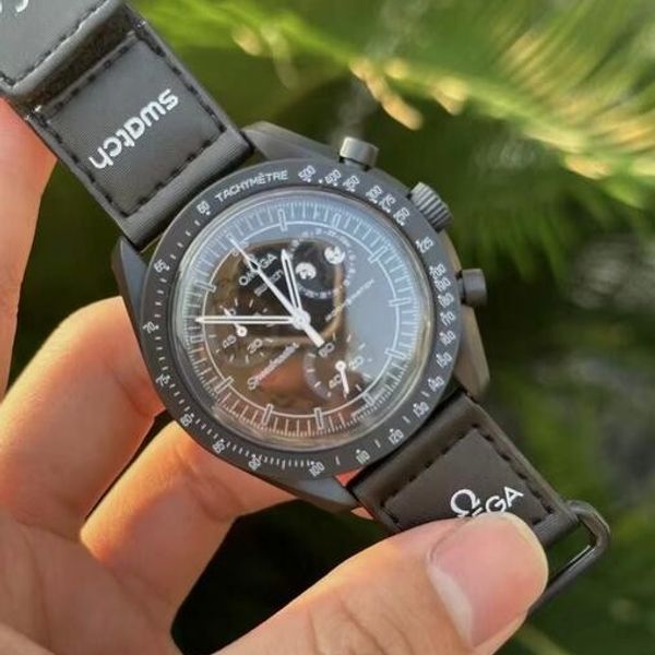 hot x Omega Bioceramic Mission to the Moon phase black MoonSwatch ...