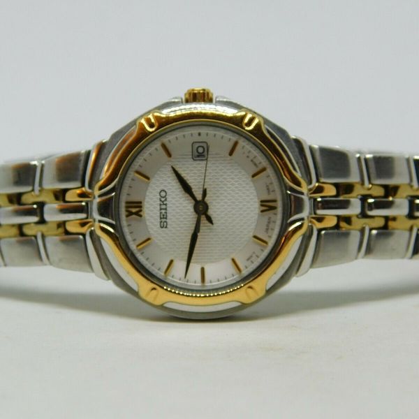 Seiko 7N82-0AT0 Two Tone Quartz Analog Ladies Watch | WatchCharts