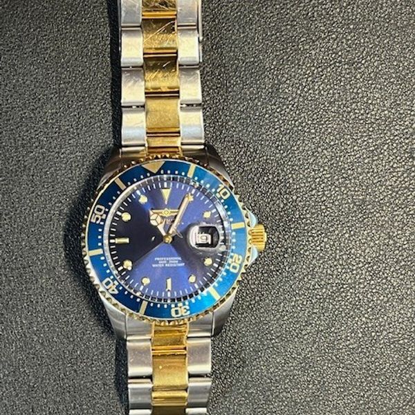 Invicta Professional dive watch blue face w/gold and SS band ...