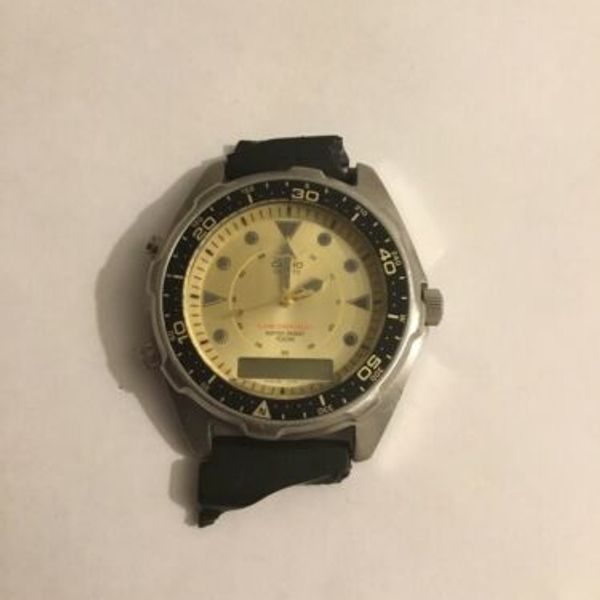 Casio Quartz Alarm Chronograph Water Resist 100M Wrist Watch 911A5-G92 ...