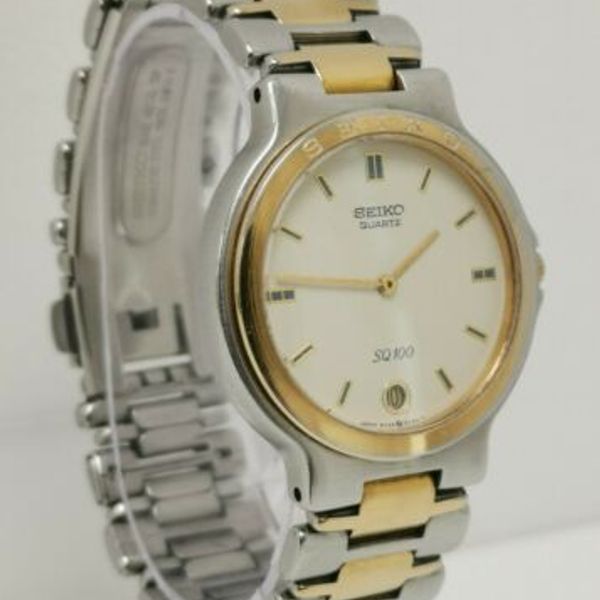 Vtg 1989 Seiko SQ100 5P29-6A50 Gold Plate Two Tone Quartz Date Gents Wrist Watch | WatchCharts ...