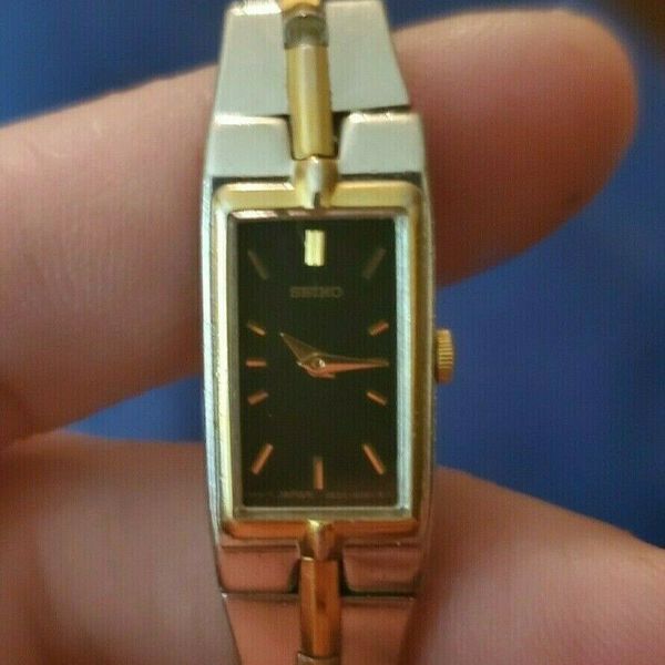 Seiko Ladies' 2E20-7479 Watch Quartz Bracelet, Black Dial, Gold ...