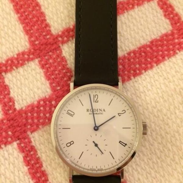 SOLD: Rodina automatic with sapphire | WatchCharts