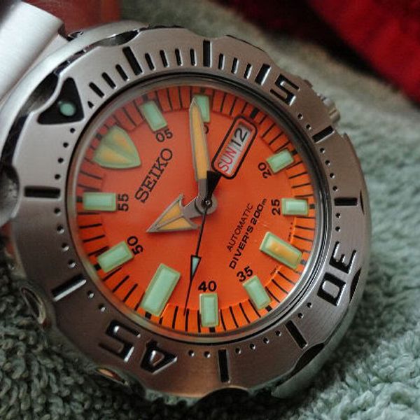 Orange Monster with messed up dial | WatchCharts Marketplace