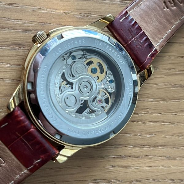 ROTARY automatic gold skeleton watch (original strap) - Running well ...