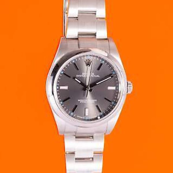 Rolex Oyster Perpetual 39mm 114300 Rhodium and Blue Dial | WatchCharts ...